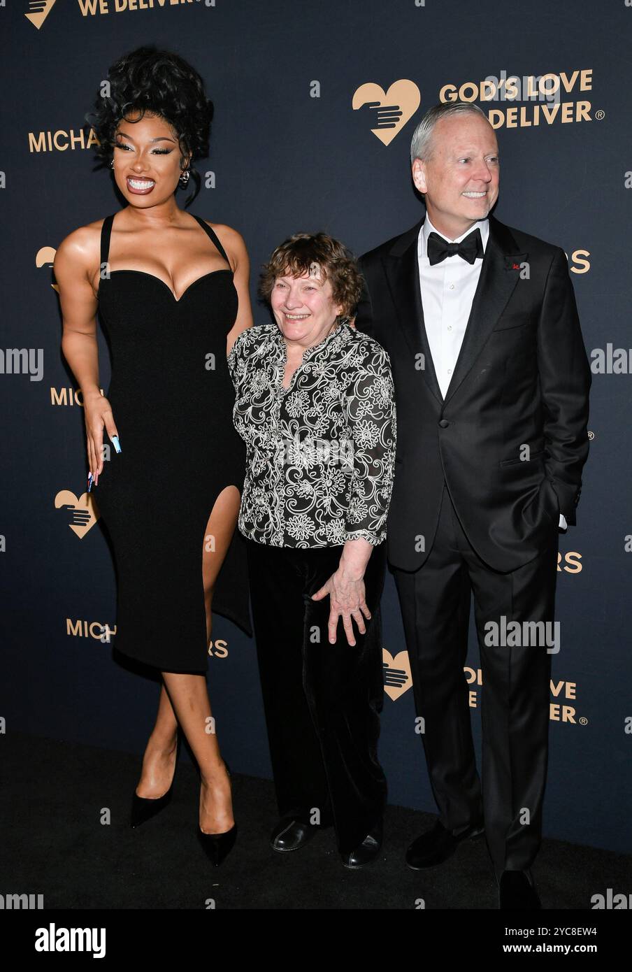 Megan Thee Stallion, left, Pat Costello and David Ludwigson attend the ...