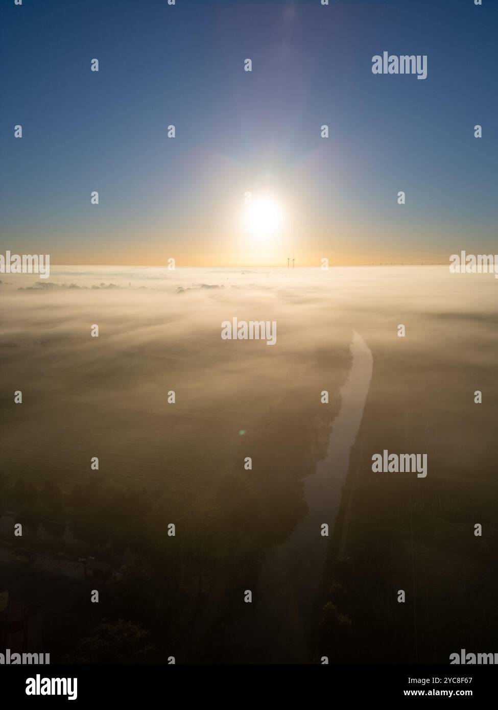 A breathtaking and stunning view of the sun slowly rising over a serene ...