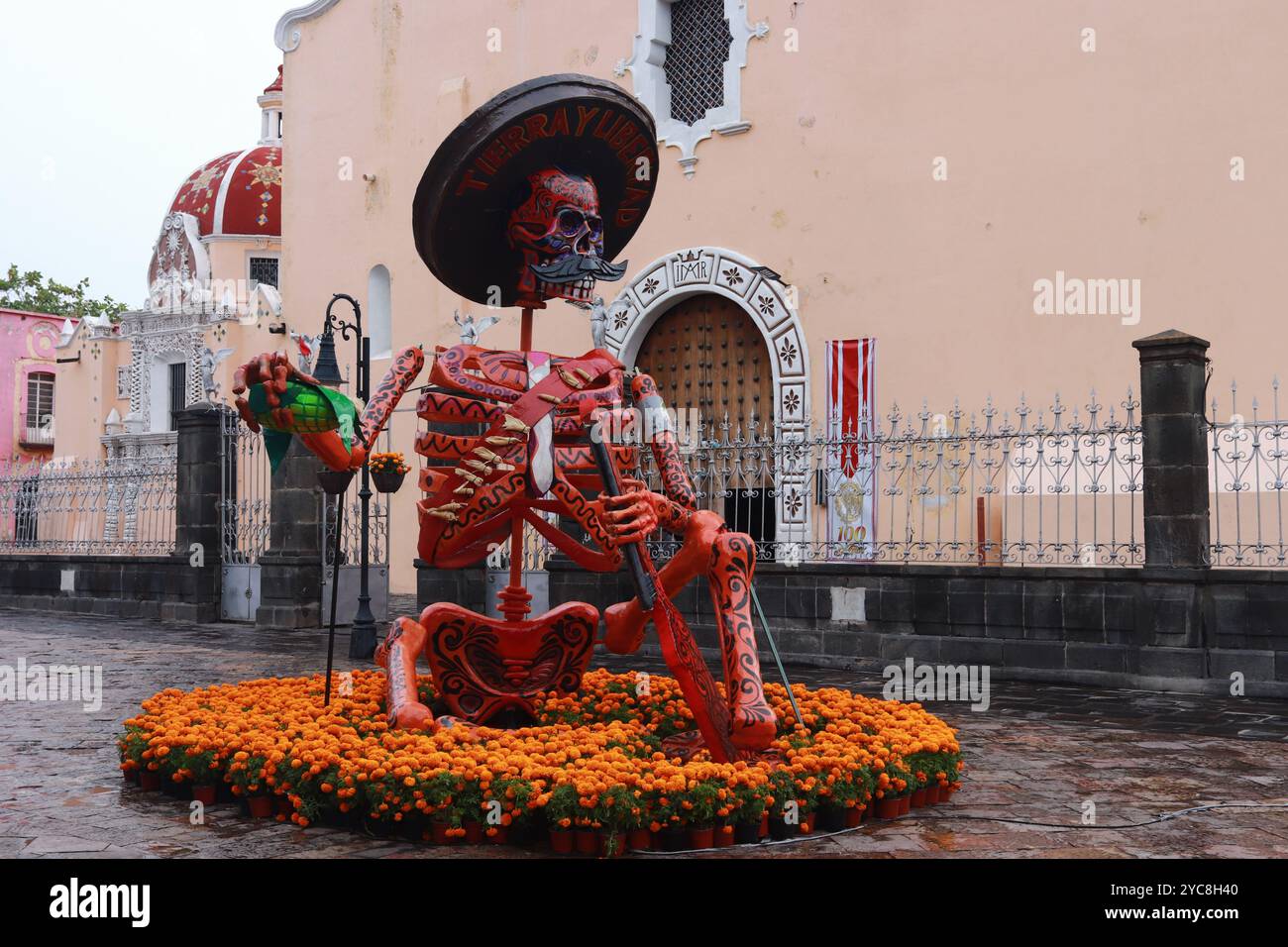 Atlixco, Mexico. 21st Oct, 2024. A cardboard monumental catrina is seen ...