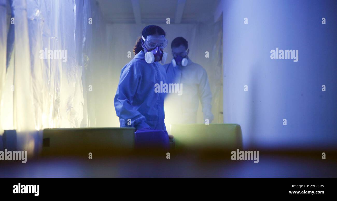 Biohazard, chemical waste and people with ppe for test, science ...