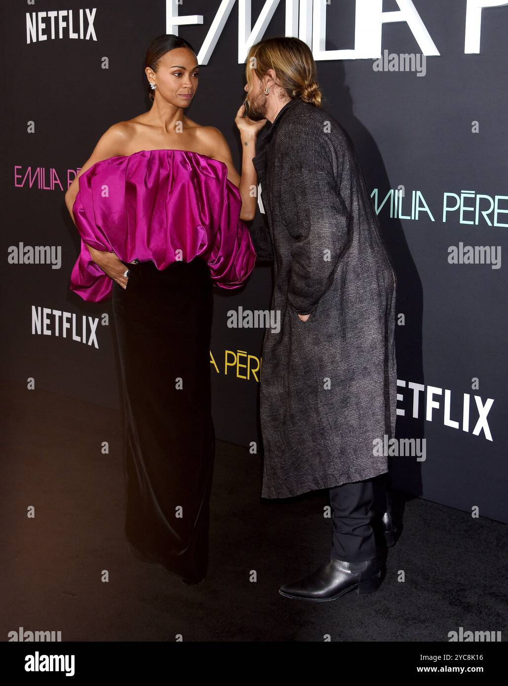 Hollywood, USA. 21st Oct, 2024. Zoe Saldana and Marco Perego arriving ...