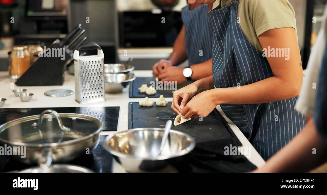 Hands, cooking and meal prep in kitchen, chef and group in hospitality ...