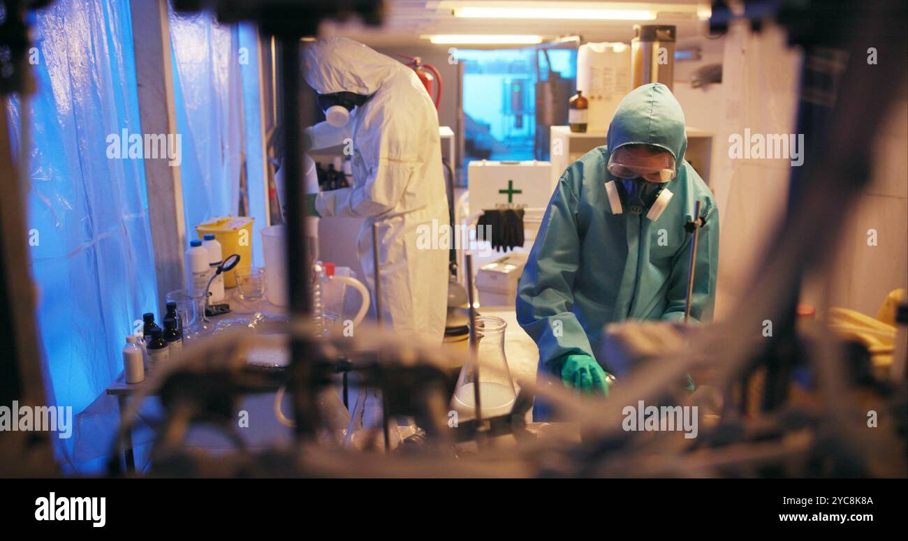 Drugs, people and gas mask with chemicals for cooking of illegal ...