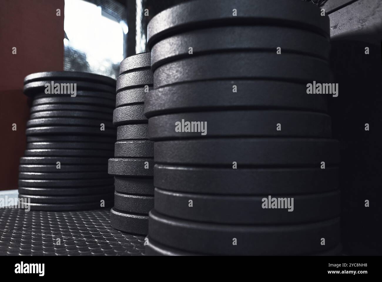 Gym, weight lifting and plates for fitness training, steel and ...