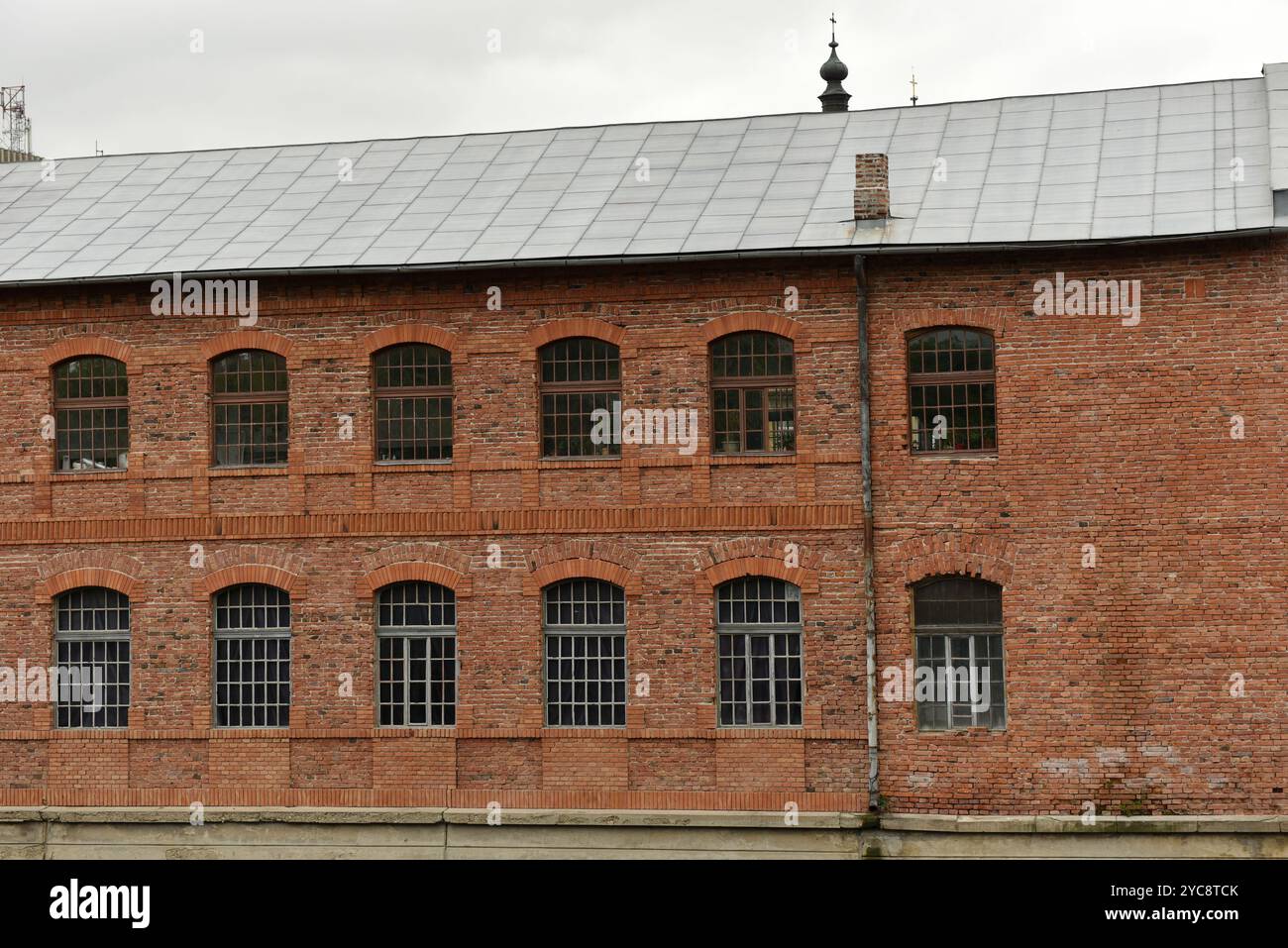 Old red brick building facade Stock Photo - Alamy