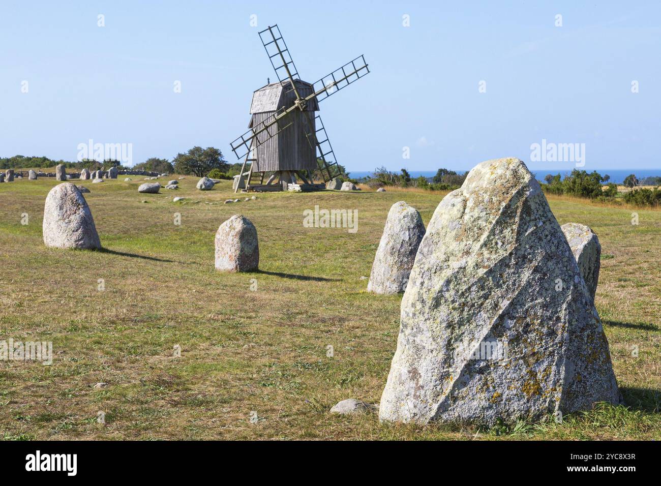 Ancient monuments with stone ship and a windmill Stock Photo - Alamy