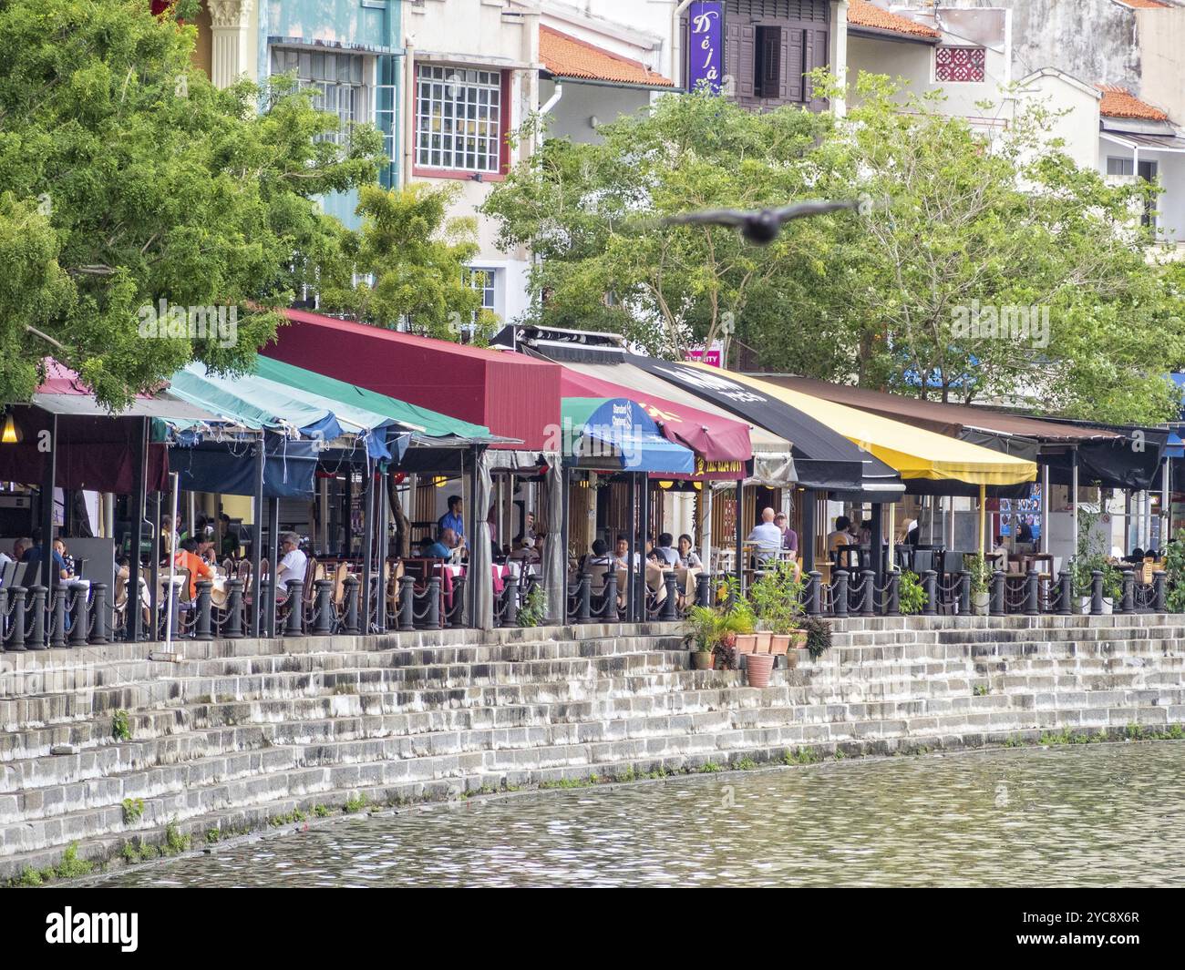 Boat Quay is a historical quay on the southern bank of the Singapore ...