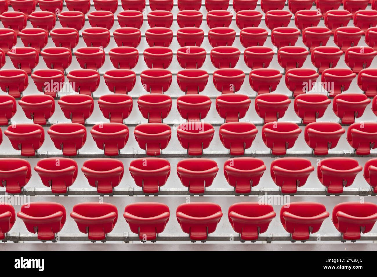 The red Stadium seats Stock Photo - Alamy