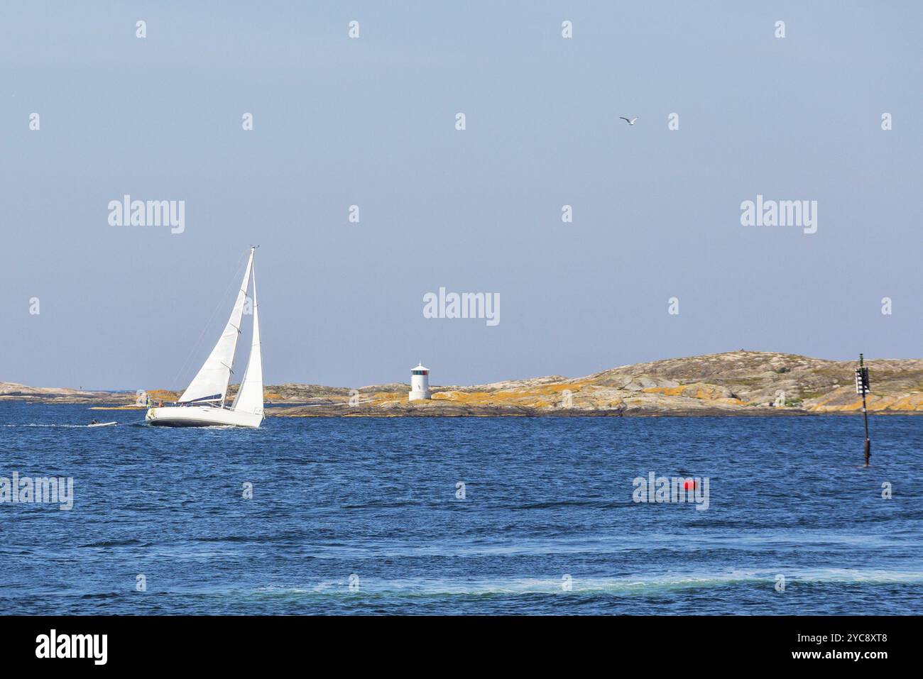 Sailing at sea into rocky archipelago Stock Photo - Alamy