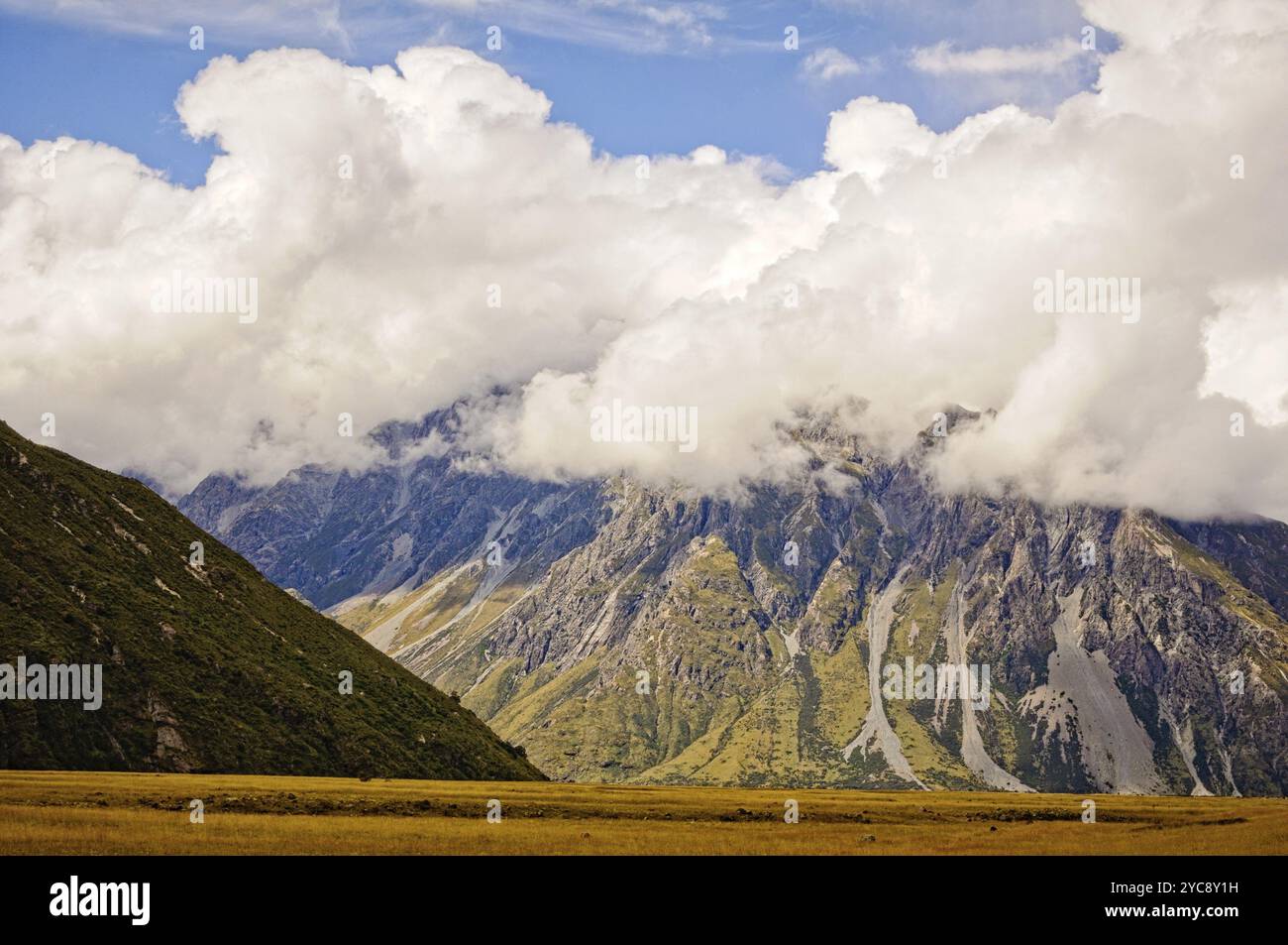 Mount Cook Range under blue sky and thick clouds on the South Island of ...