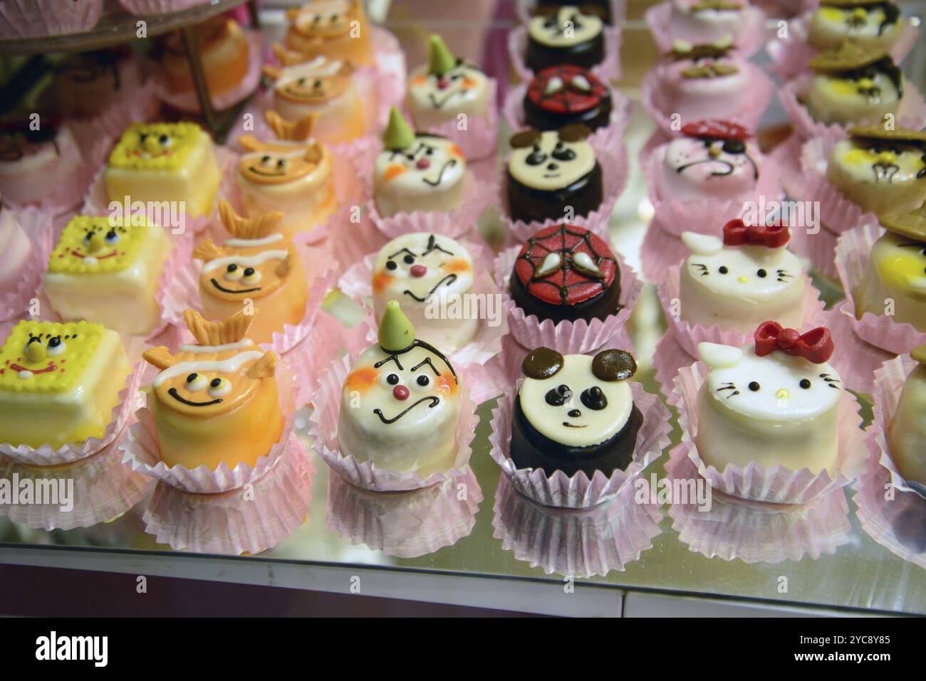 Sweet cakes of showcase of cafe in Vienna, some dessert with sugar ...