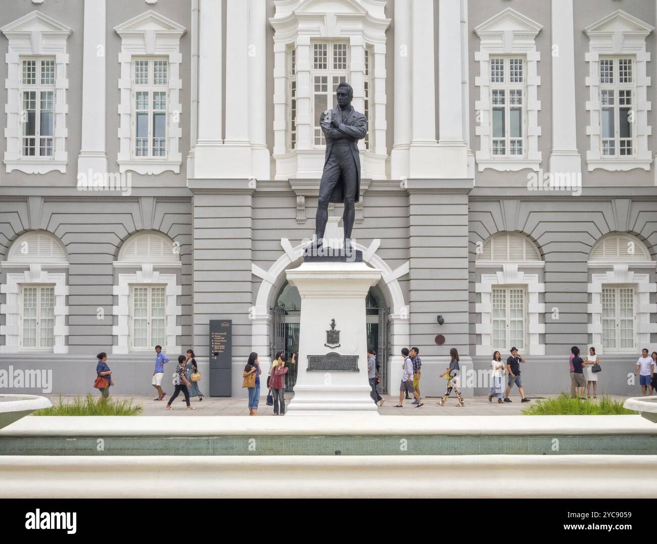 Bronze statue of Stamford Raffles by Thomas Woolner in front of the Victoria Theatre and Concert ...
