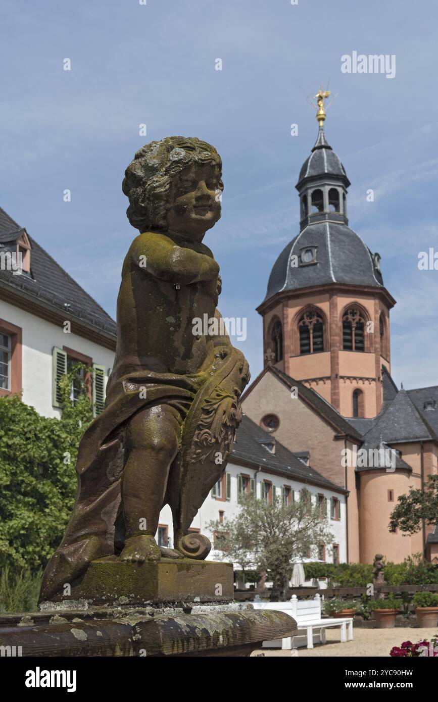 Putto in the monastery garden of the church of St. Marcellinus and ...