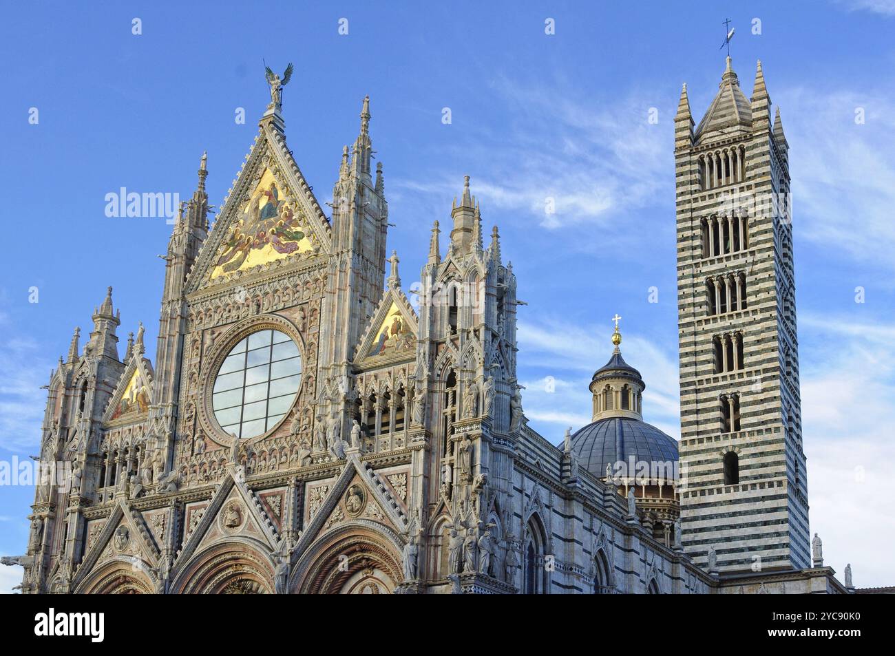 The main facade, the dome and the tower of the Cathedral of Siena ...
