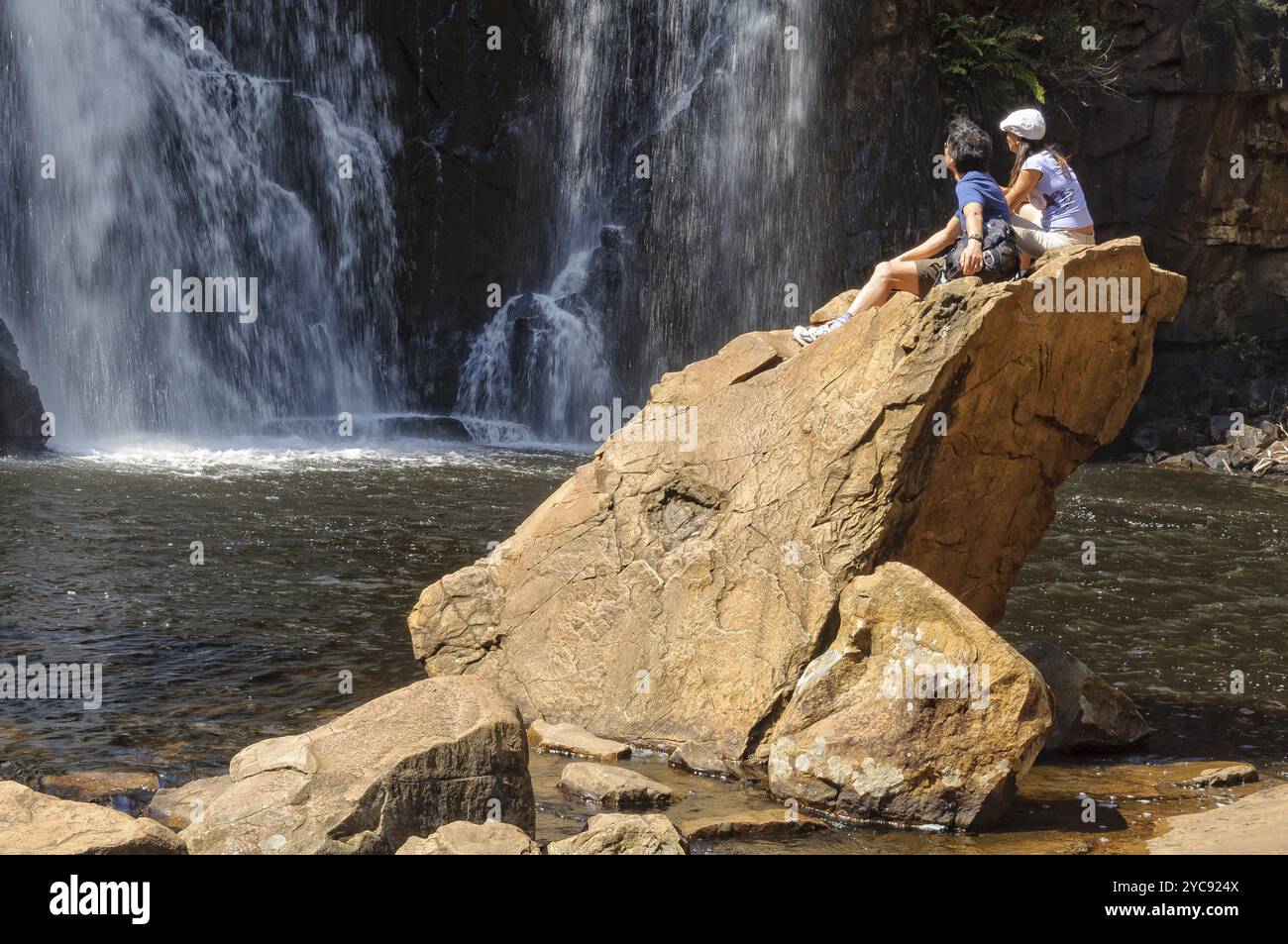 A young couple is admiring the majestic MacKenzie Falls in the ...