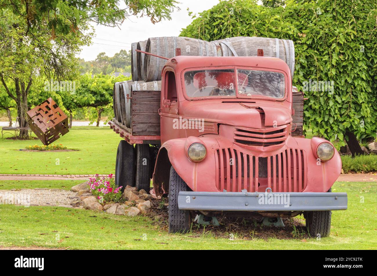 Old red wine barrel truck on display at Swanbrook Winery Cafe in the ...