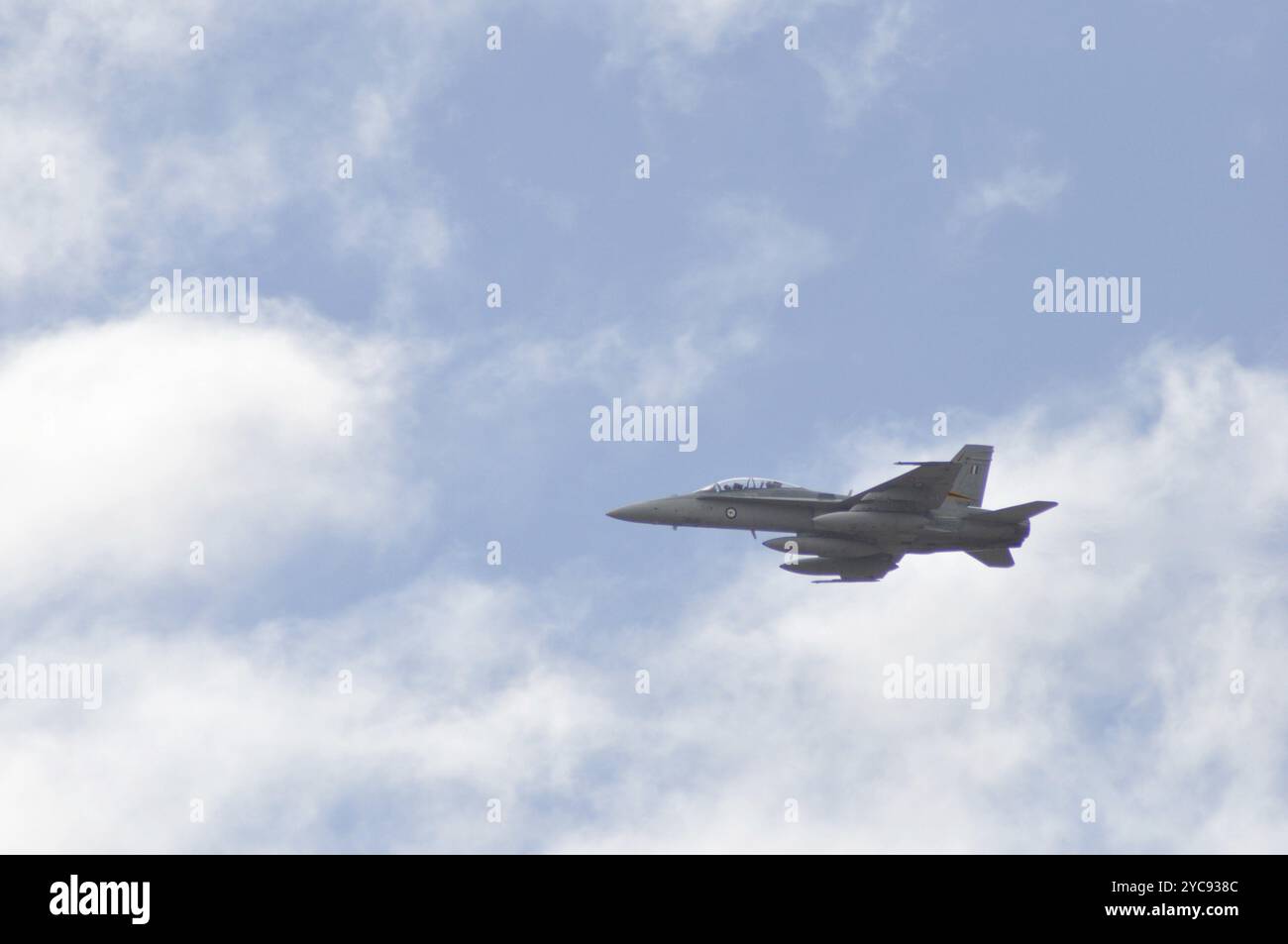 Royal Australian Air Force F-18 fighter jet against clouds Stock Photo ...