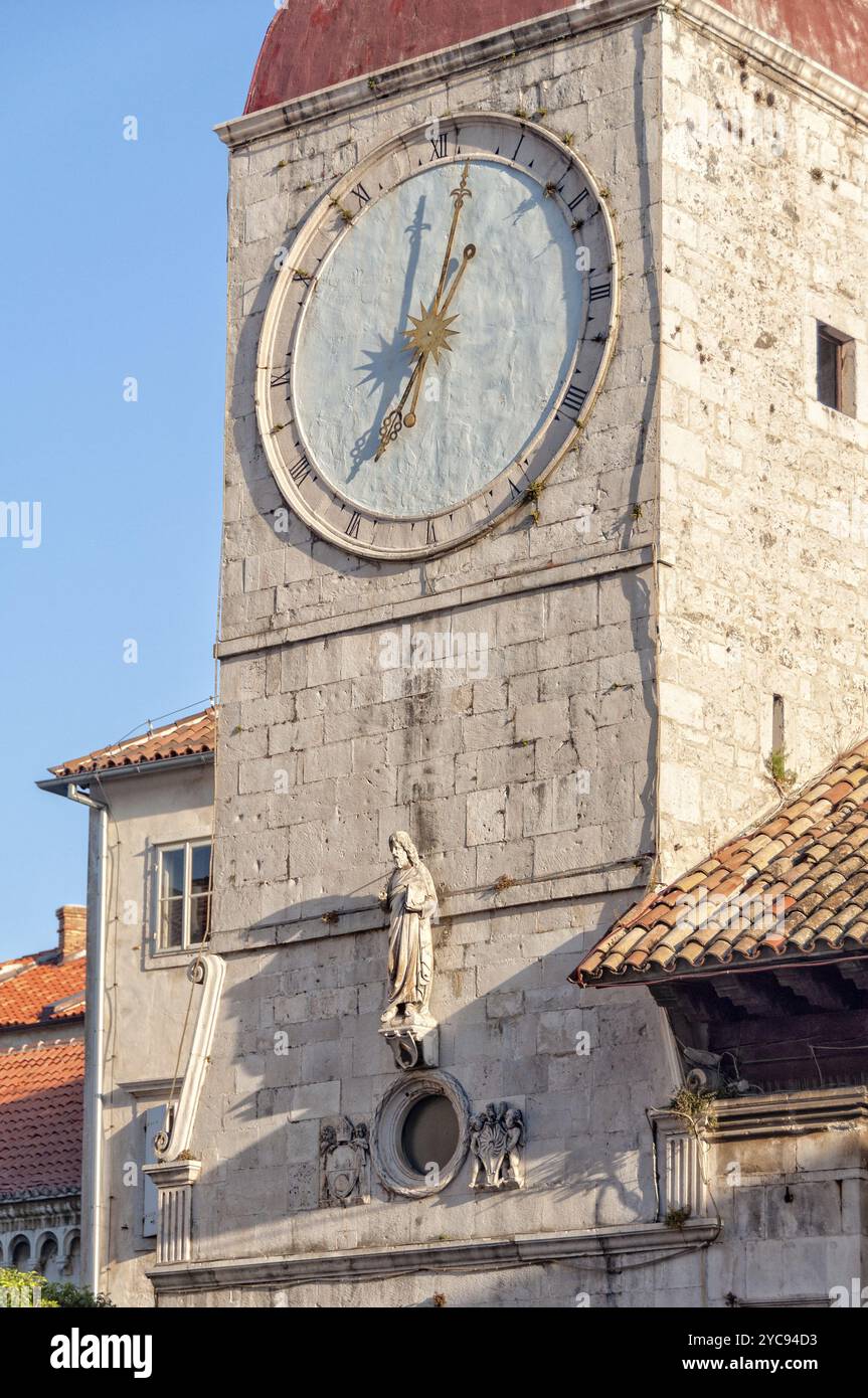 The Clock Tower of the former church of St. Sebastian with the statue ...
