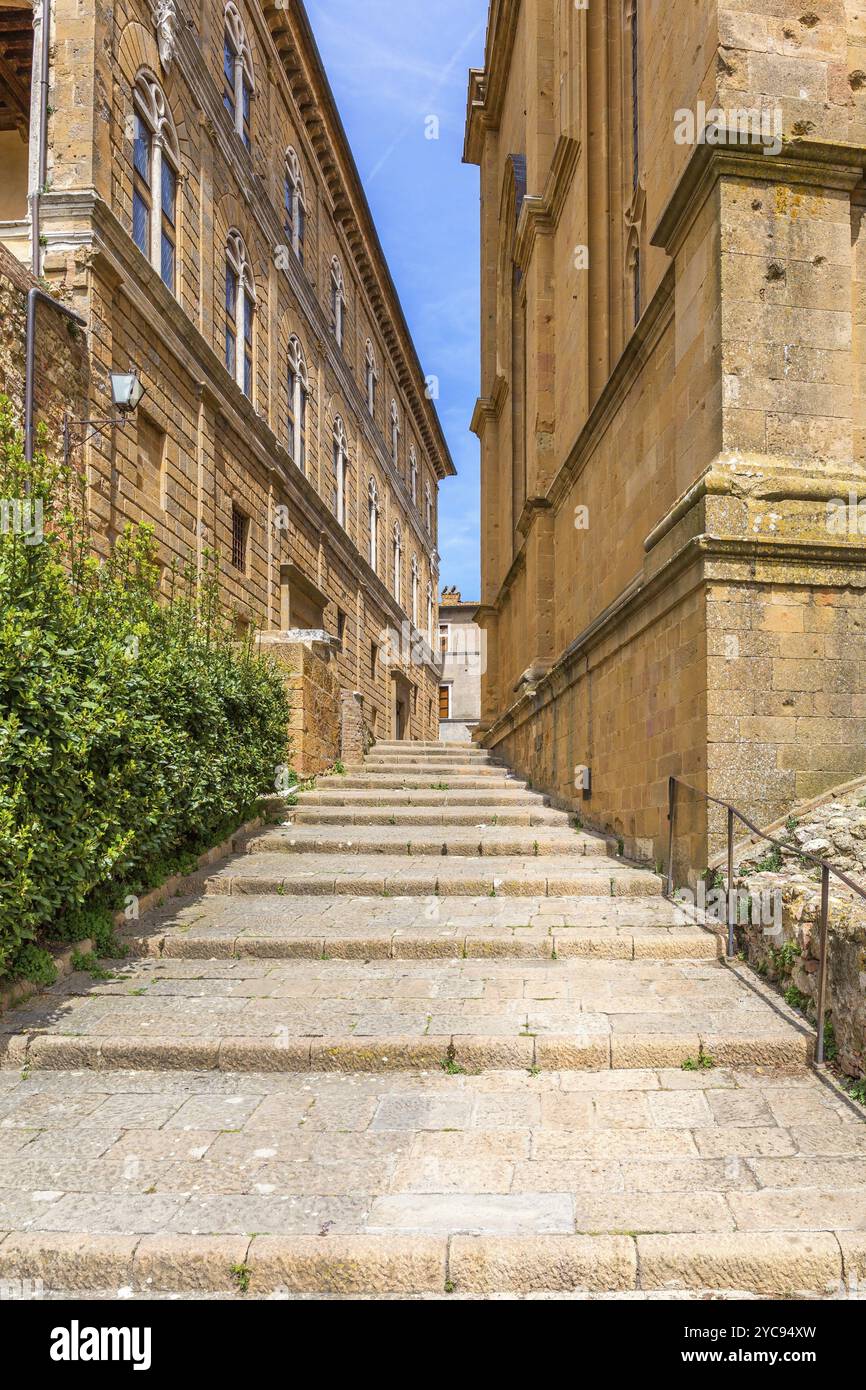 Staircase between houses in an Italian town Stock Photo - Alamy