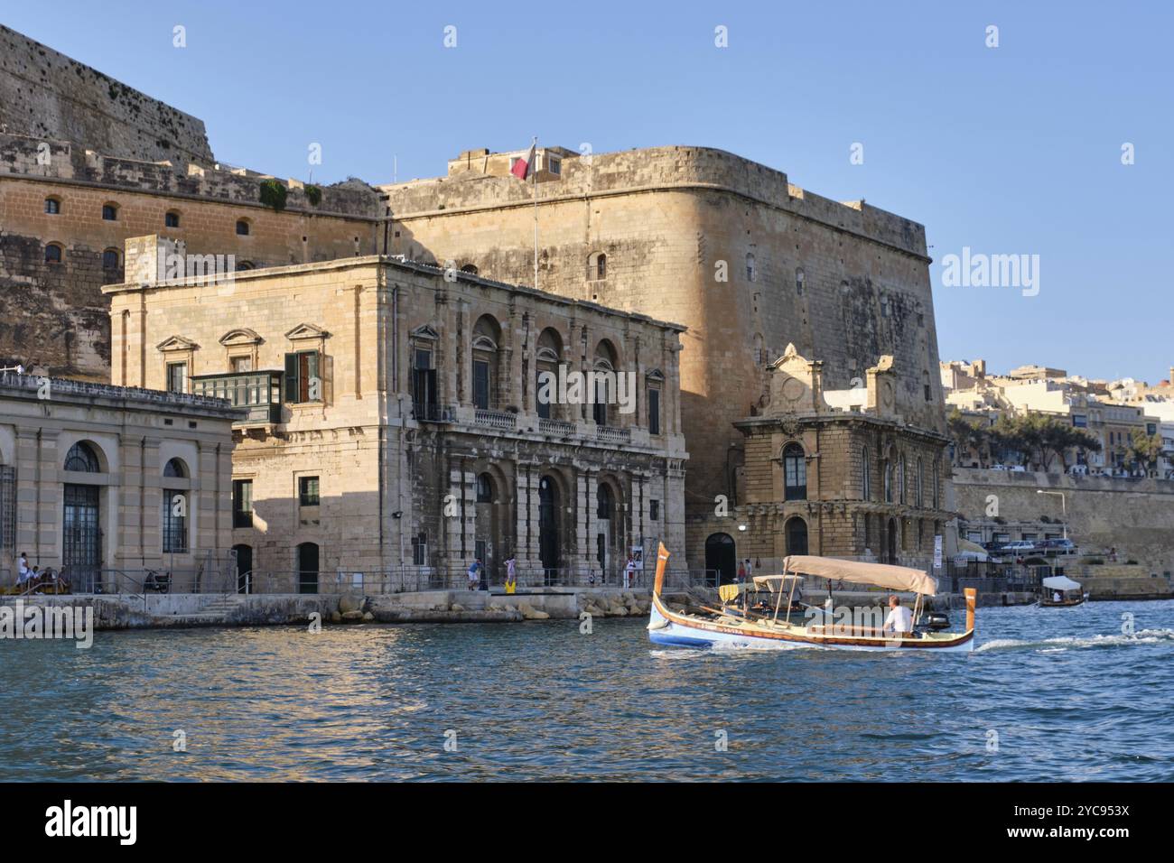 Traditional Maltese boat luzzu at the tip of Senglea, Valletta, Malta ...