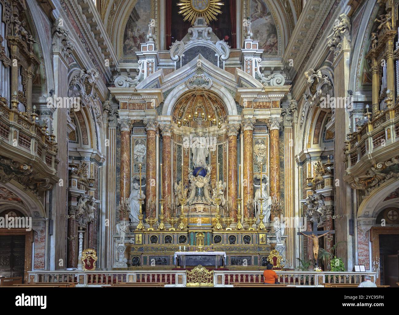 The apse and the main altar of the Church of Gesu Nuovo with the ...