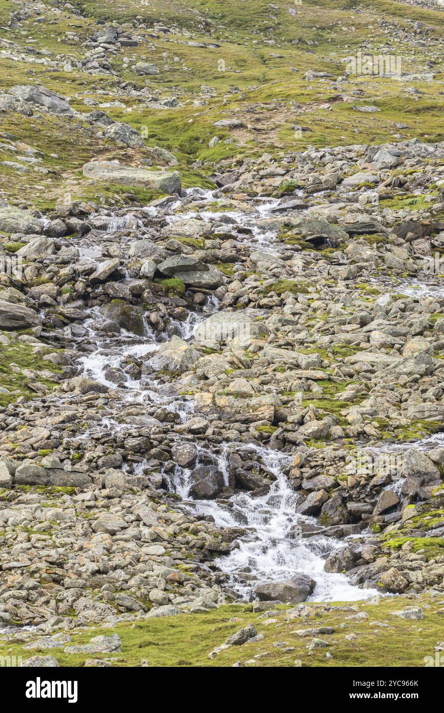 Waterfall in a block field landscape Stock Photo - Alamy