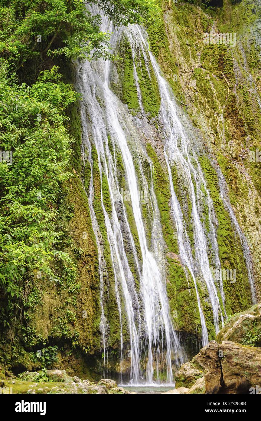 Part of the 35m tall upper section of the Mele Cascades Waterfalls ...