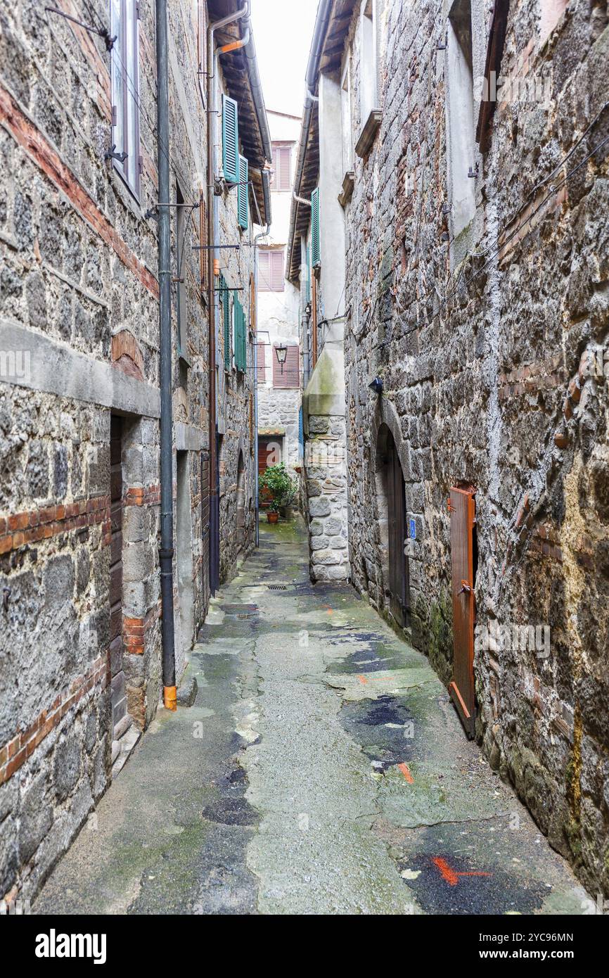 Narrow alley in the old city Stock Photo - Alamy