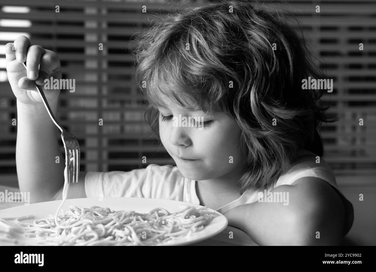 Kids eating pasta Black and White Stock Photos & Images - Alamy