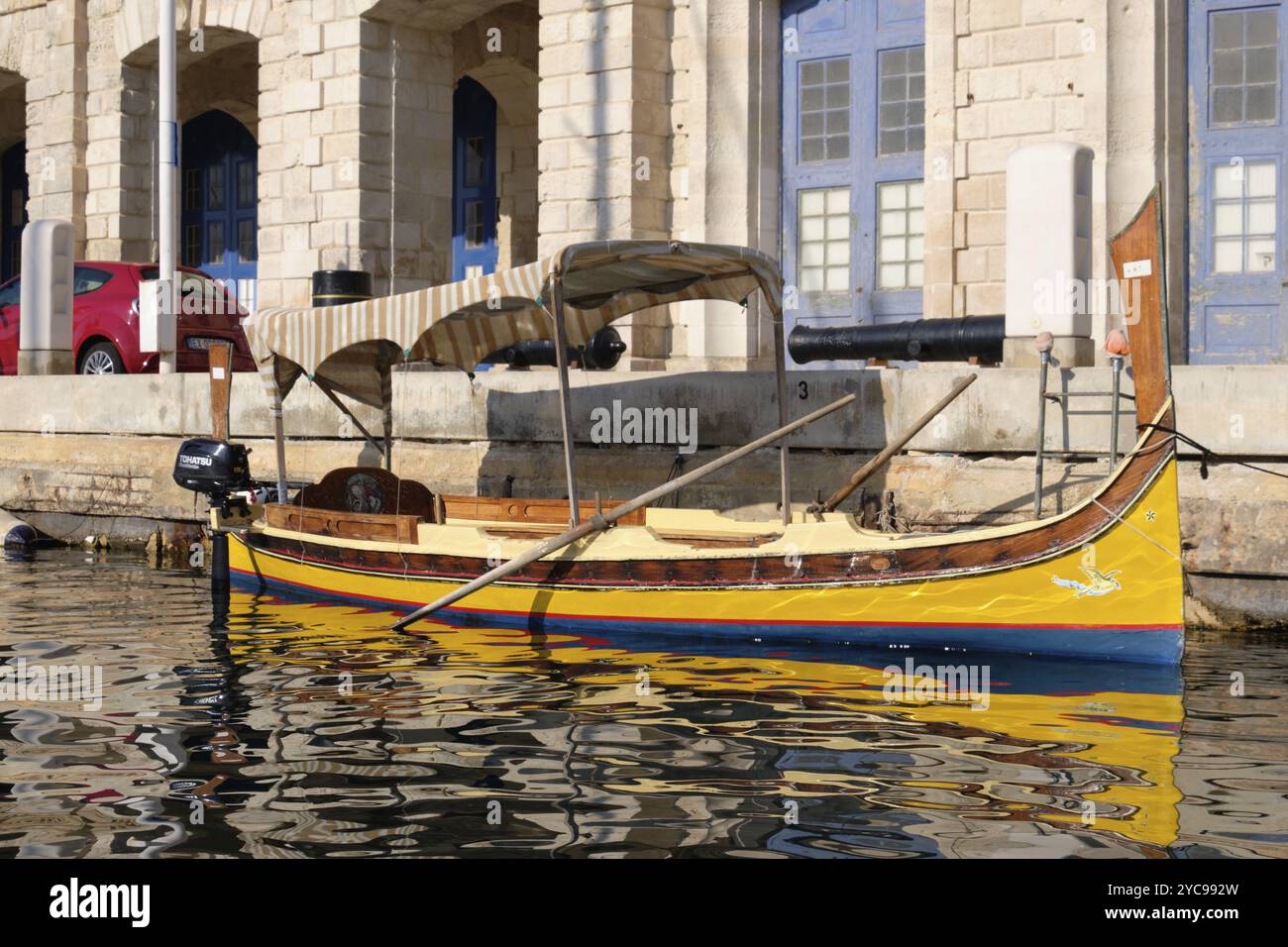 Colourful traditional Maltese boat luzzu in the Grand Harbour Marina ...