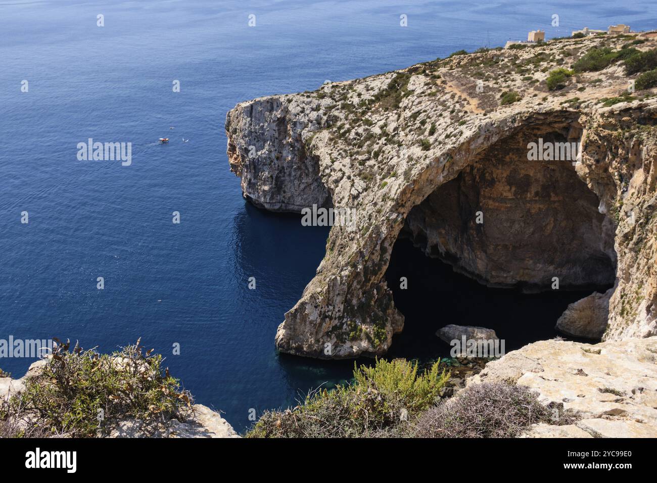 The natural arch of the Blue Grotto photograophed from the Blue Wall ...