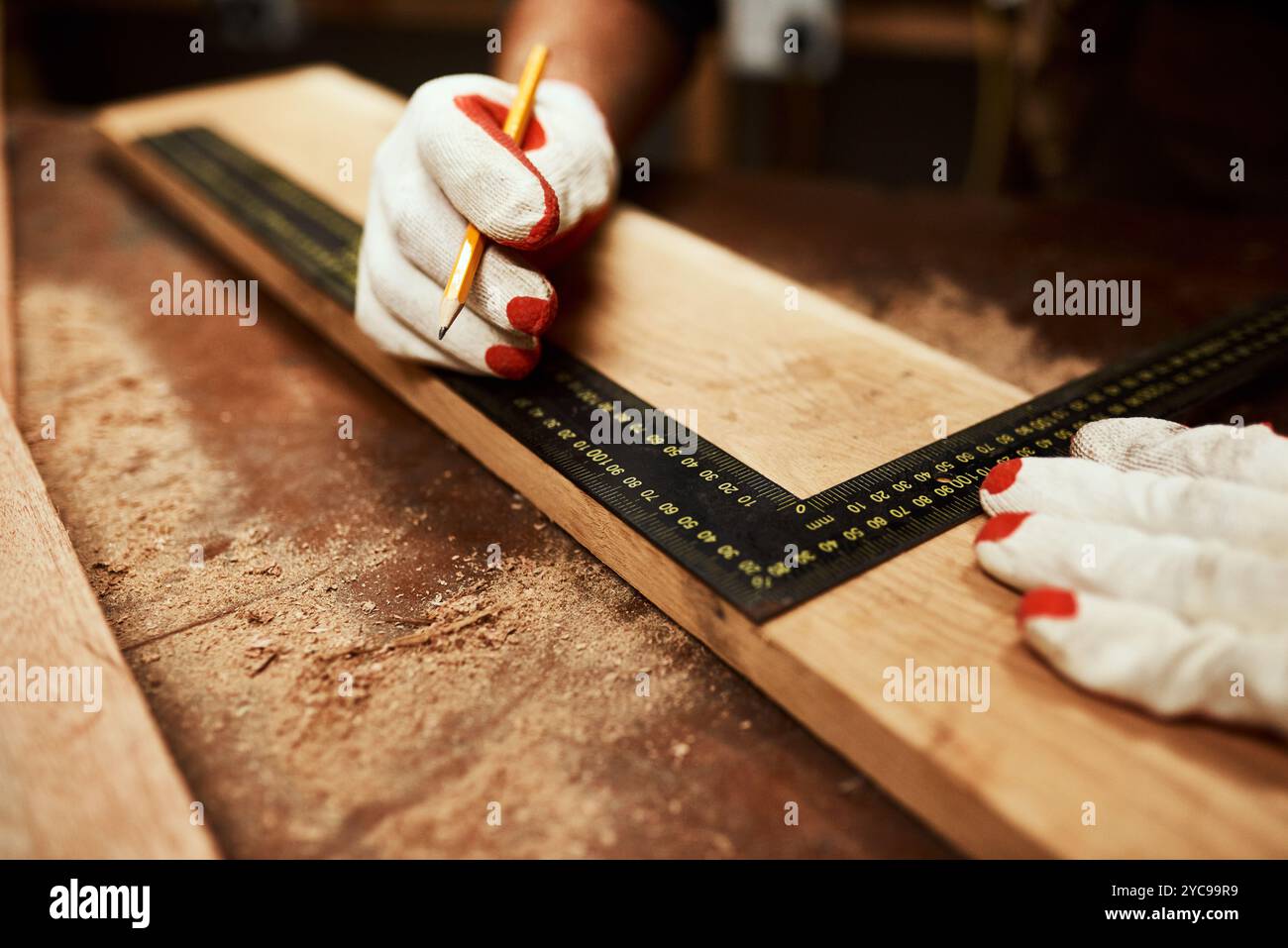 Man, hands and ruler to measure wood at workshop, carpenter and tool ...