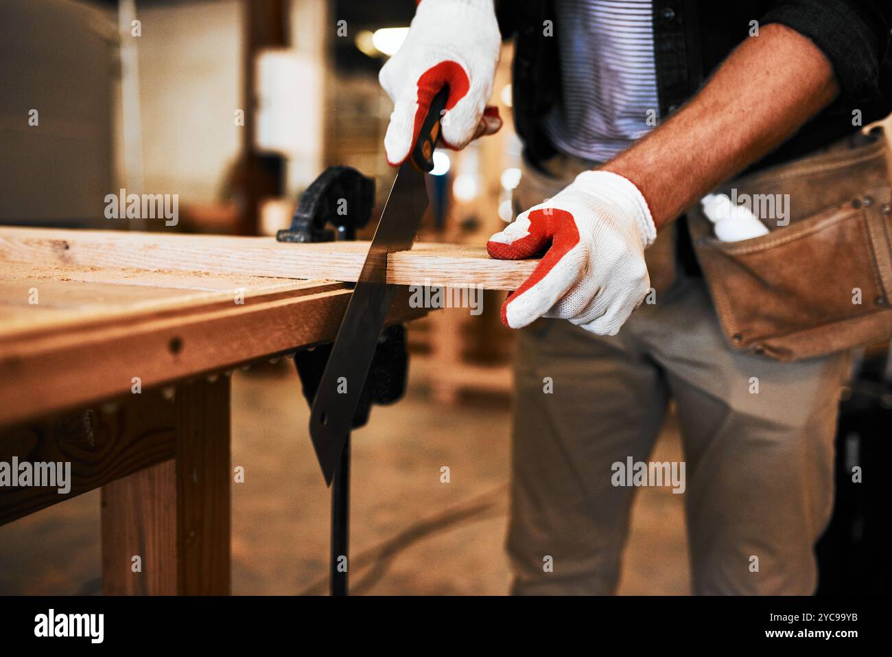 Wood, hand saw and carpentry with man, tools and construction with ...