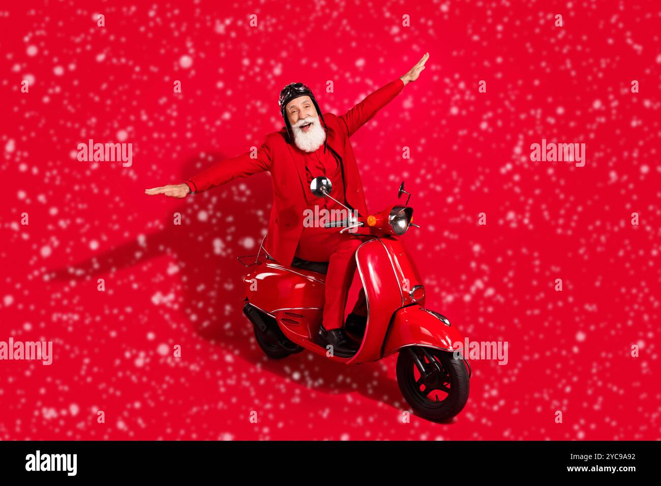 Photo of santa claus ride bike imagine plane flying hands wings wear ...