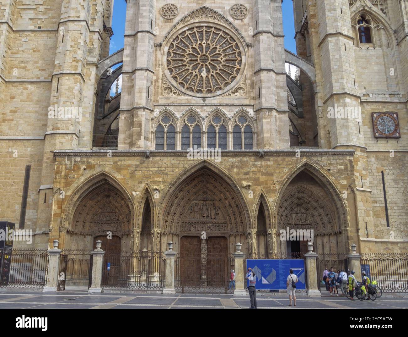 The three portals and the large central rose window of the Santa Maria ...