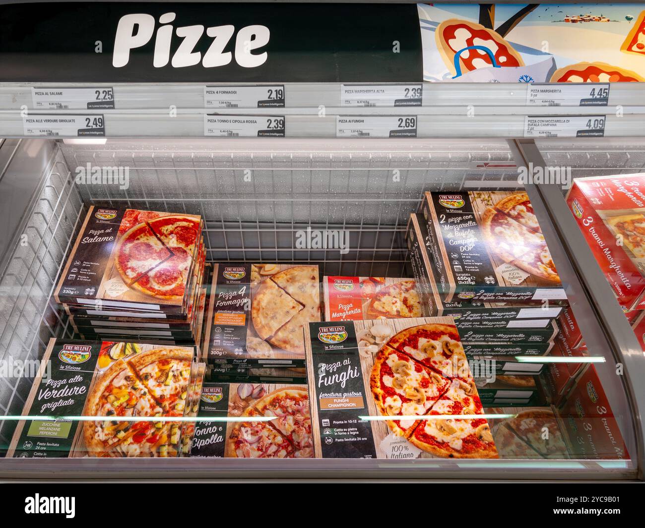 Italy - October 21, 2024: Frozen pre-cooked pizzas of various types and ...