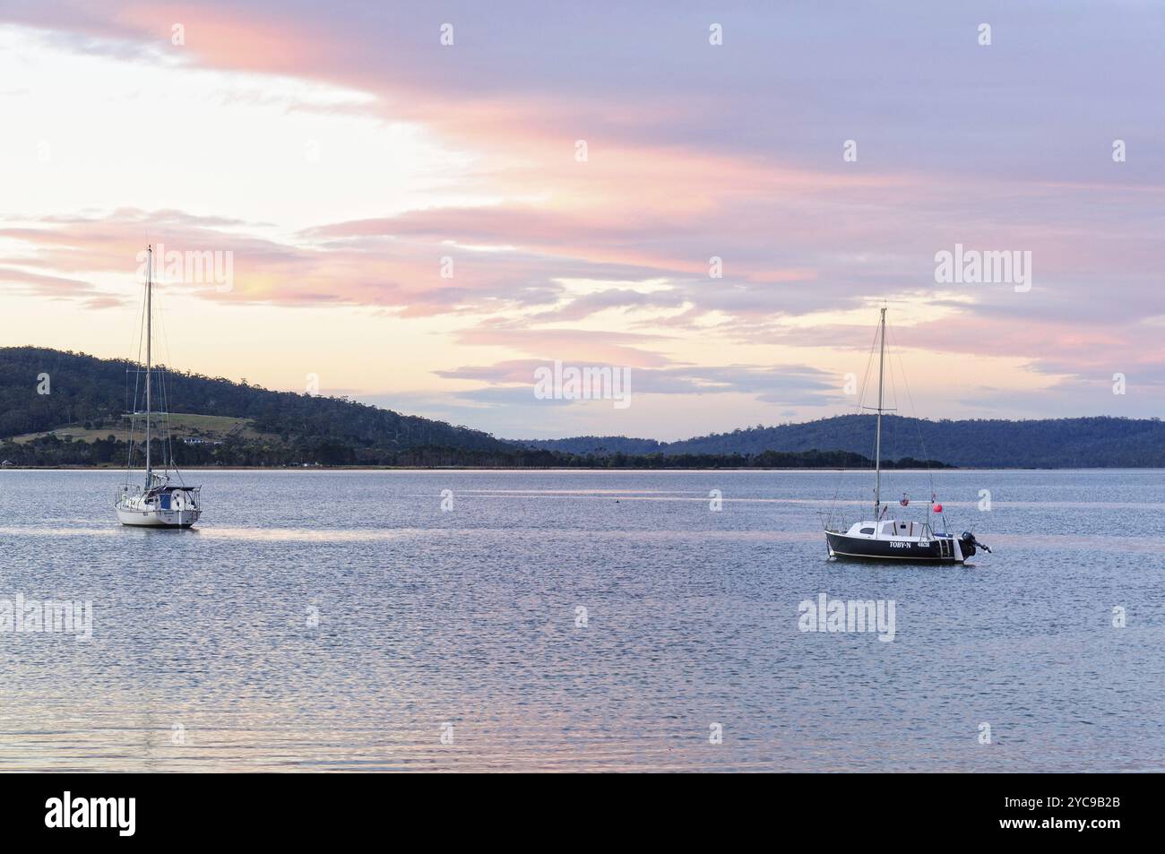 Sailing boats at anchor in Georges Bay, St Helens, Tasmania, Australia ...