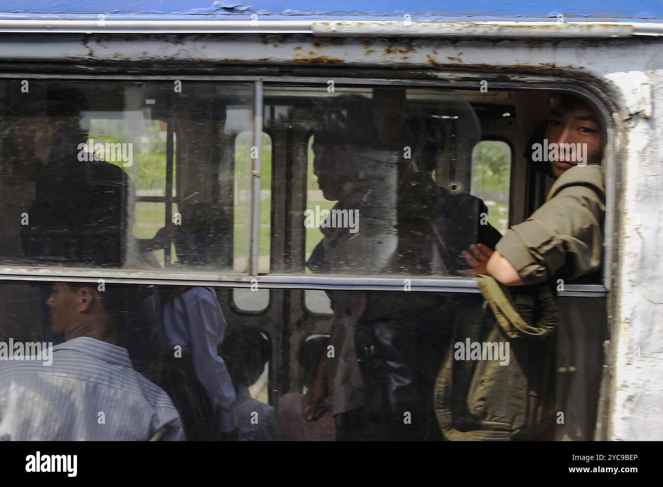09.08.2012, Pyongyang, North Korea, Asia, Passengers in a crowded tram ...