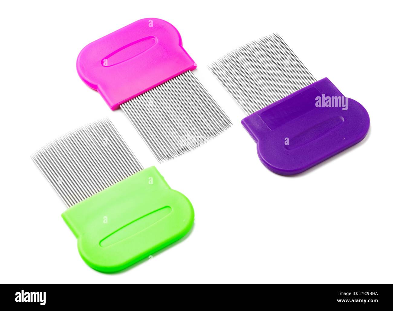 Colorful plastic and metal combs on a white background Stock Photo - Alamy