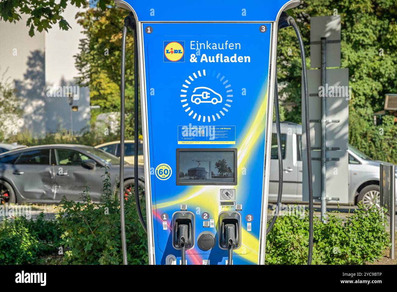 Electric car charging station, Lidl supermarket parking lot, Berlin ...