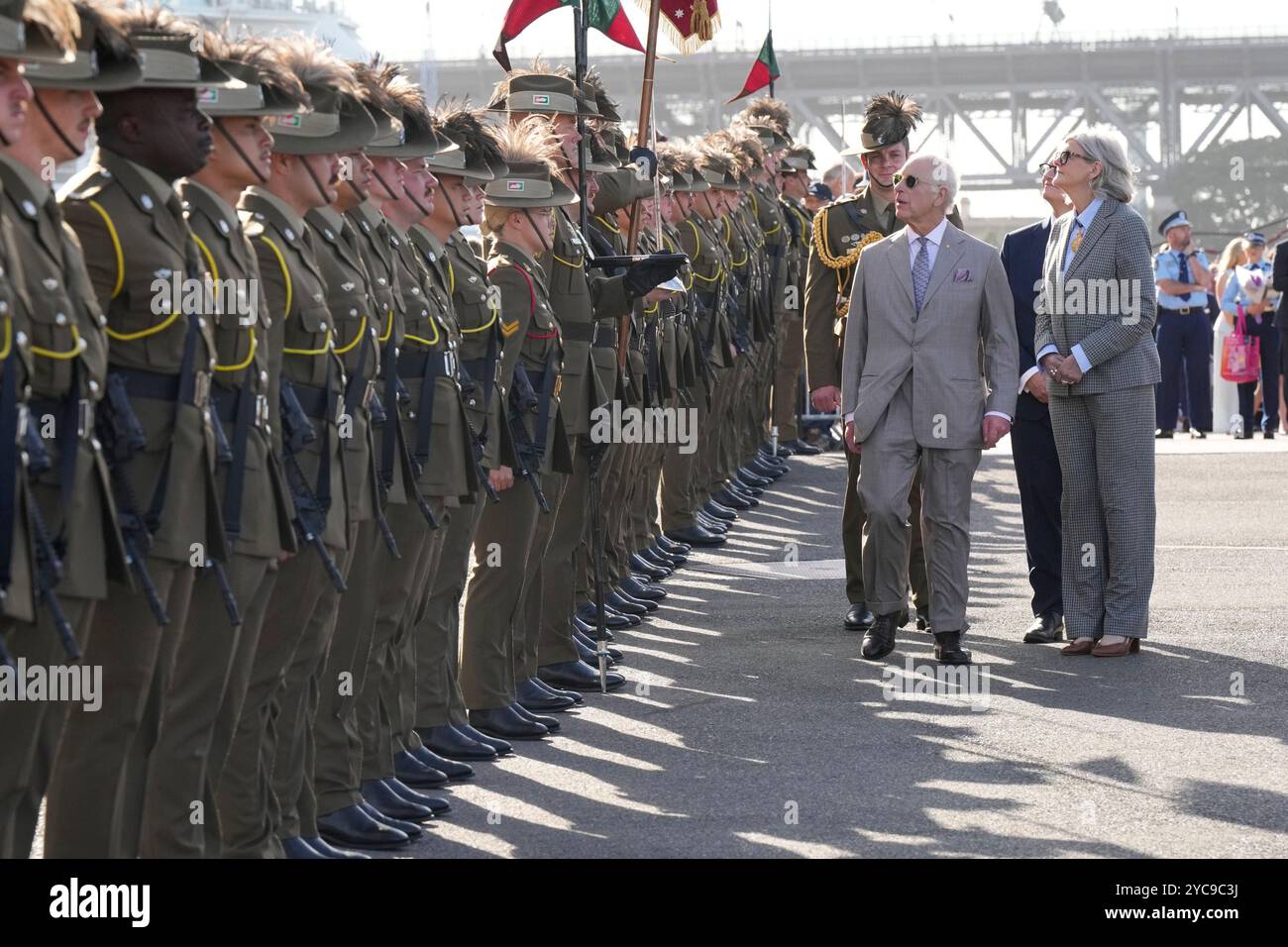 Britain's King Charles III, second from right, inspects the honor ...