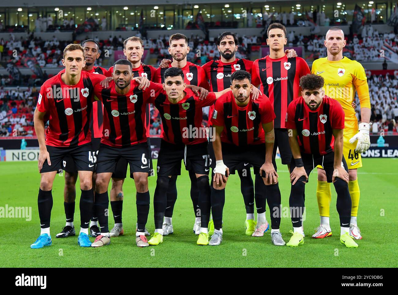 Al Rayyan, Qatar. 21st Oct, 2024. Players of Al Rayyan SC pose for a ...