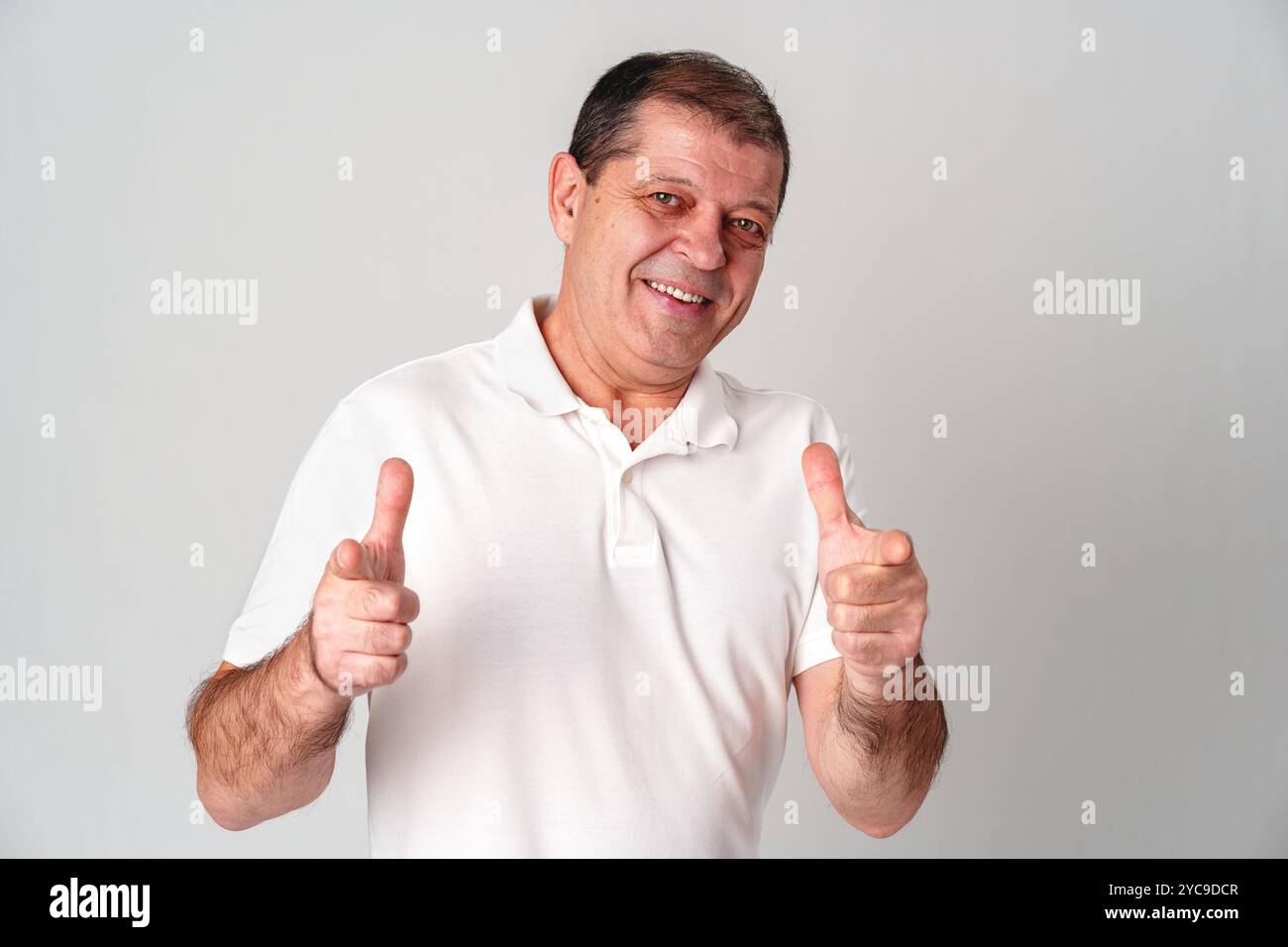 Senior man reaching out hands hi-res stock photography and images - Alamy