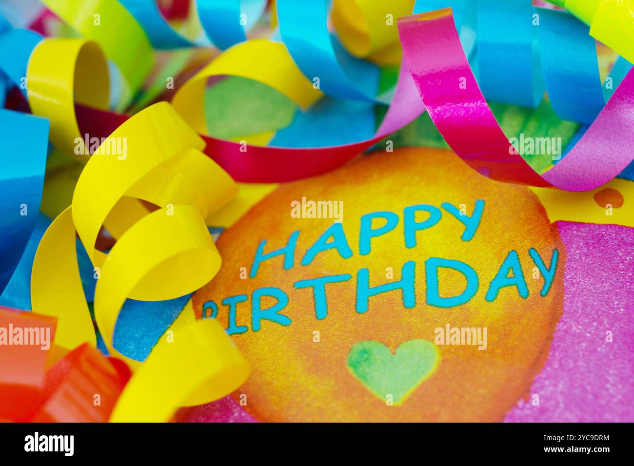 Birthday present with colorful gift ribbons Stock Photo - Alamy