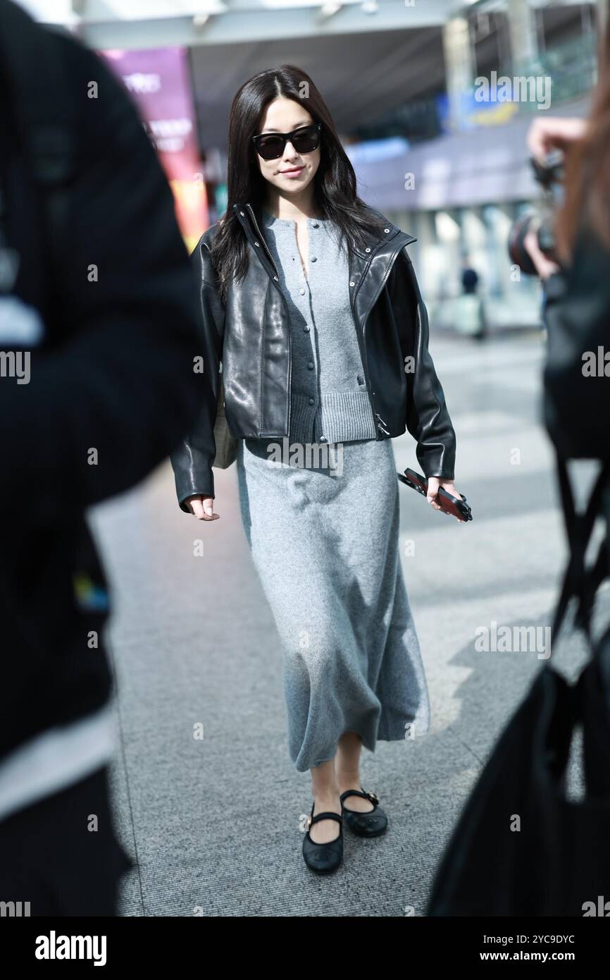 Chinese actress and singer Zhu Zhu appears at the airport in Beijing ...