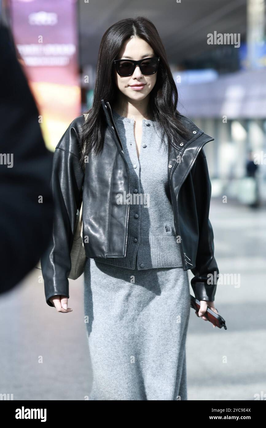 Chinese actress and singer Zhu Zhu appears at the airport in Beijing ...