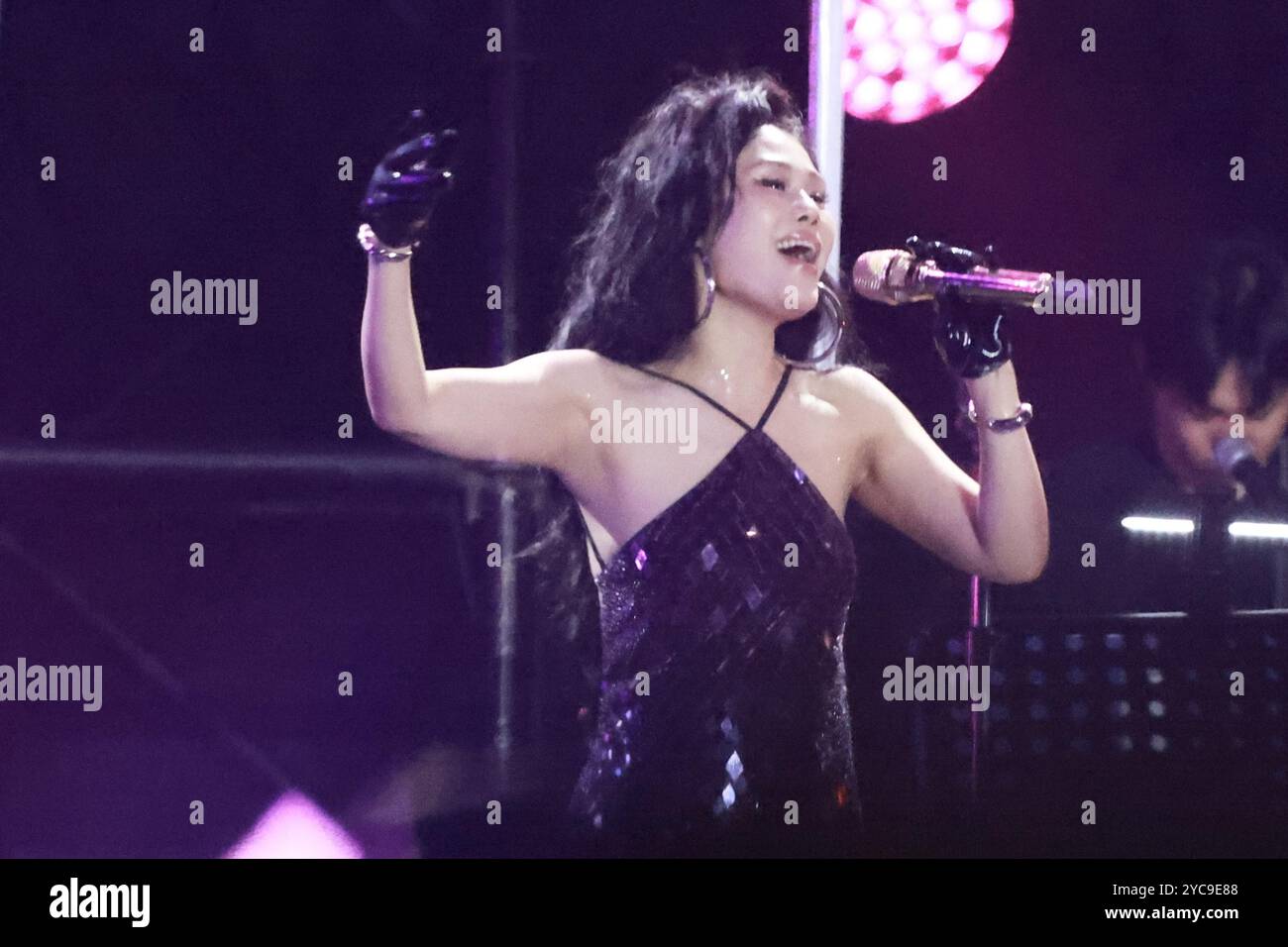 Chinese singer-songwriter Tia Ray attends an activity in Chengdu City, southwest China's Sichuan ...