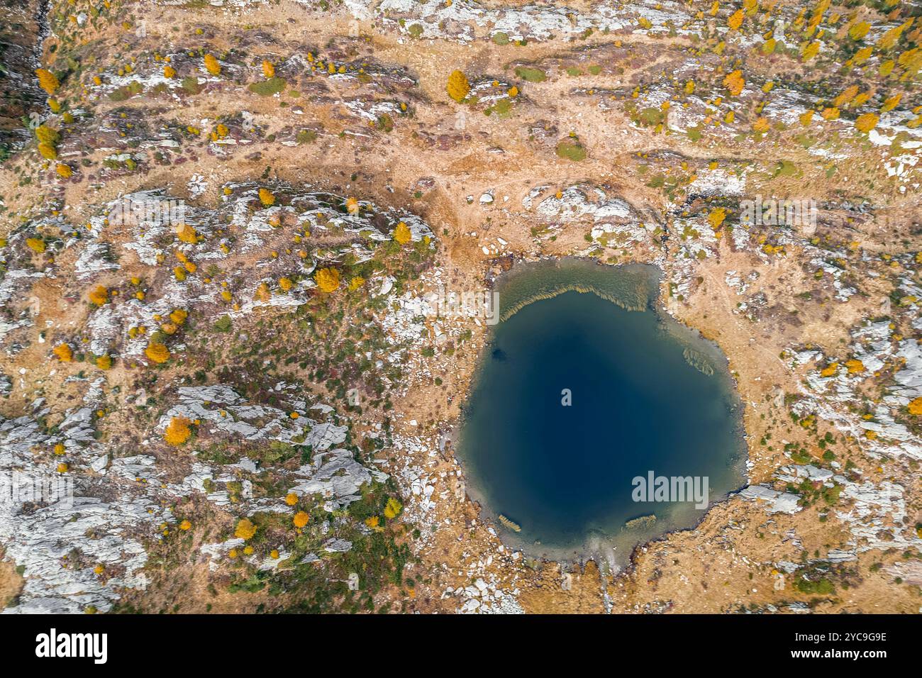 The blue eye, Lake of Zana drone view, Valmalenco Stock Photo - Alamy