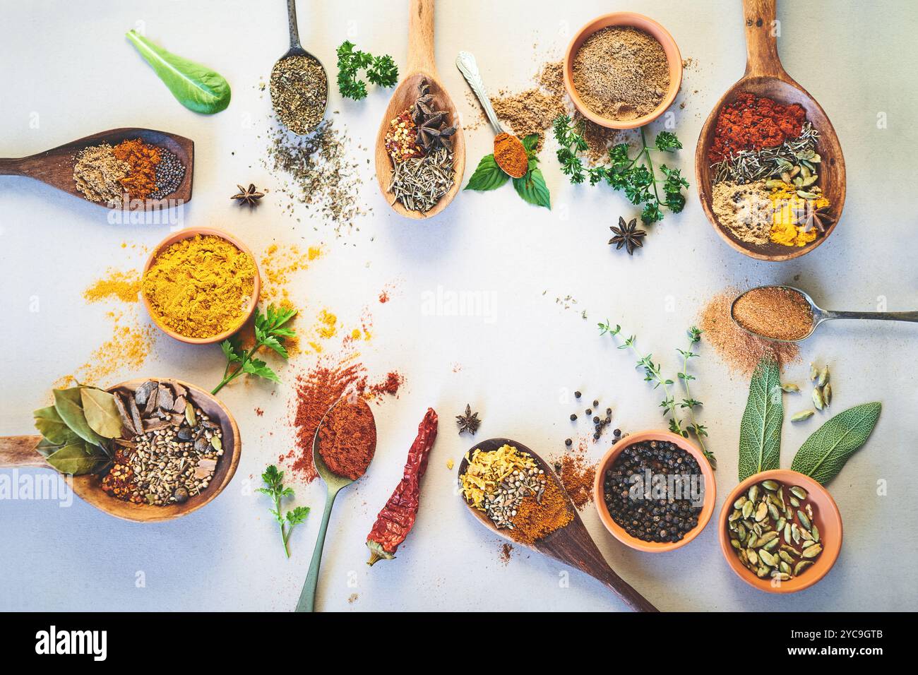 Spices, ingredients and selection of organic seasoning on studio ...