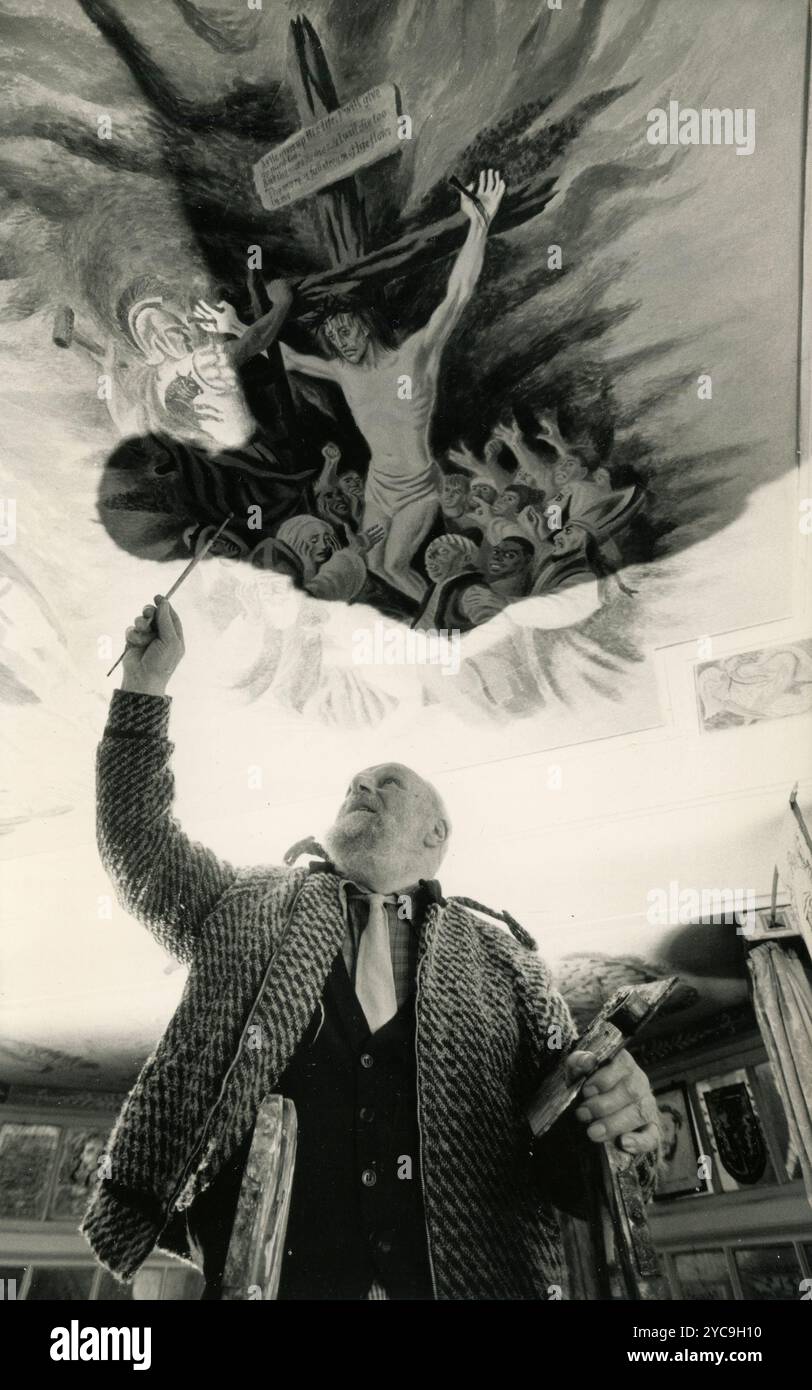 British artist Lewis Lupton painting the ceiling of his house, England ...
